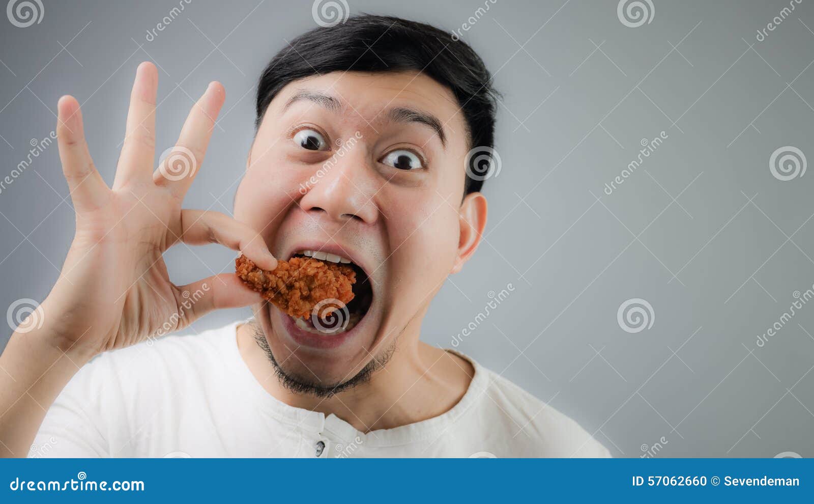 An Asian Man with Fried Chicken. Stock Photo - Image of calorie, face ...