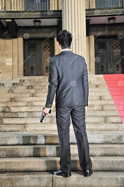 Asian Man with a Gun with Back Facing Viewer 2 Stock Photo - Image of ...