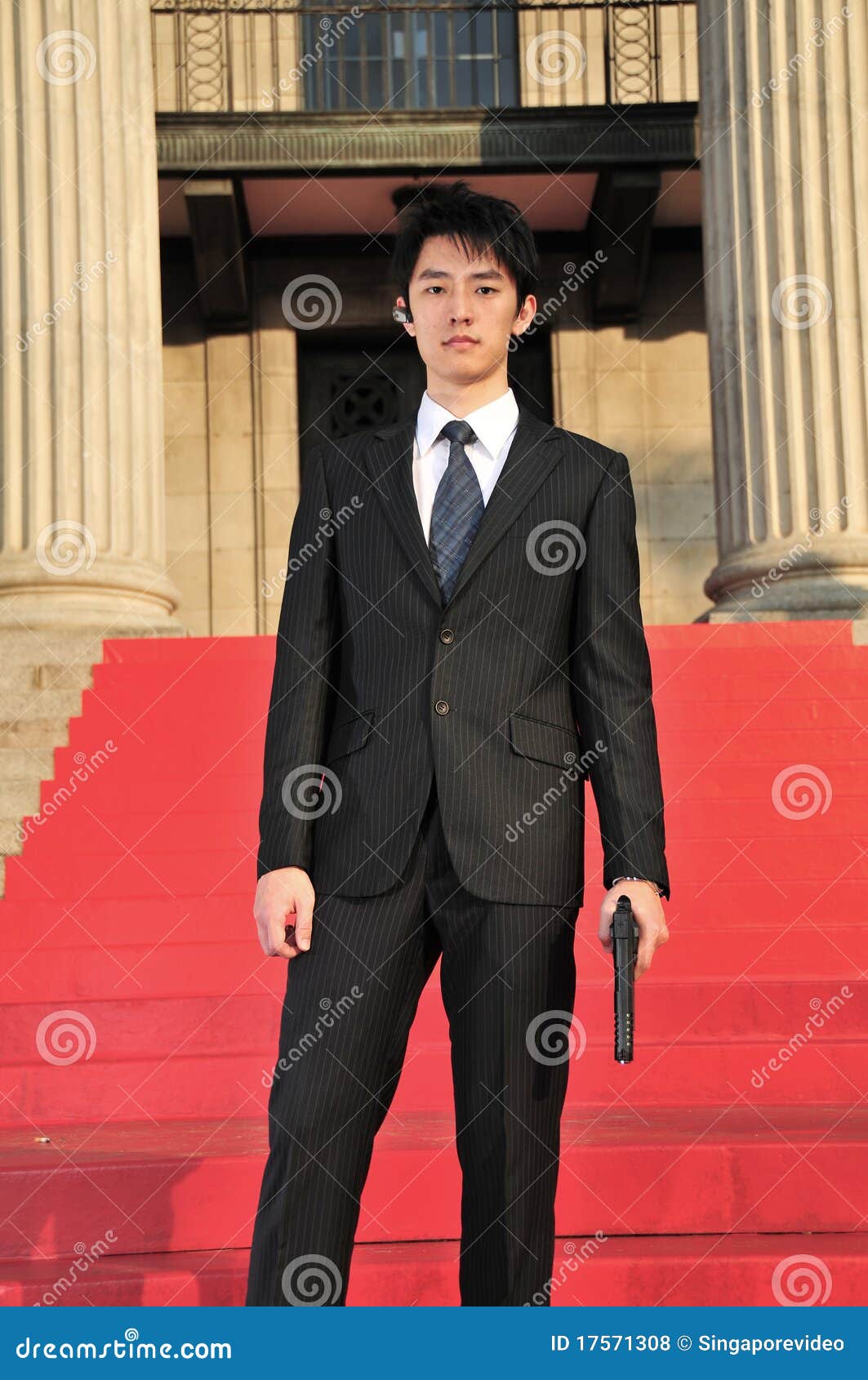 Asian Man with a Gun Looking into the Camera 3 Stock Photo - Image of ...