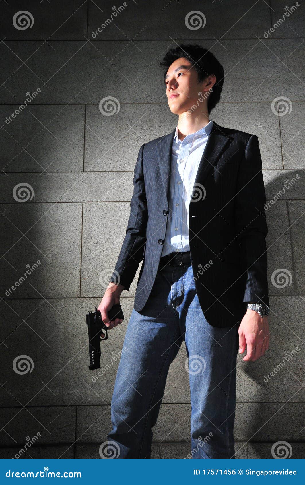 Asian Man with a Gun Standing in the Shadow Stock Photo - Image of ...