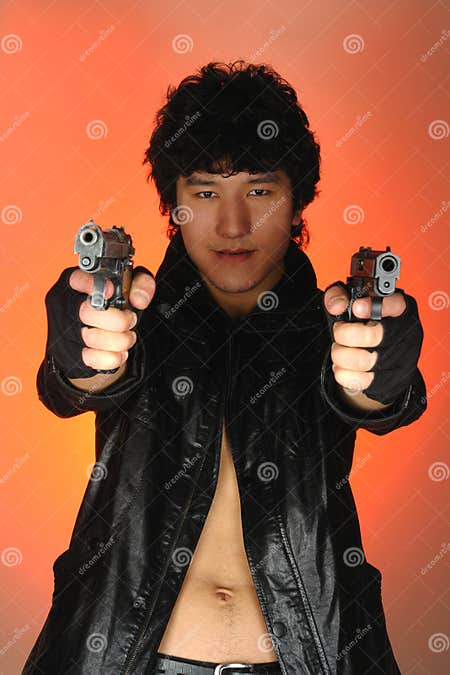 Asian man with guns stock photo. Image of japanese, conflict - 13849740
