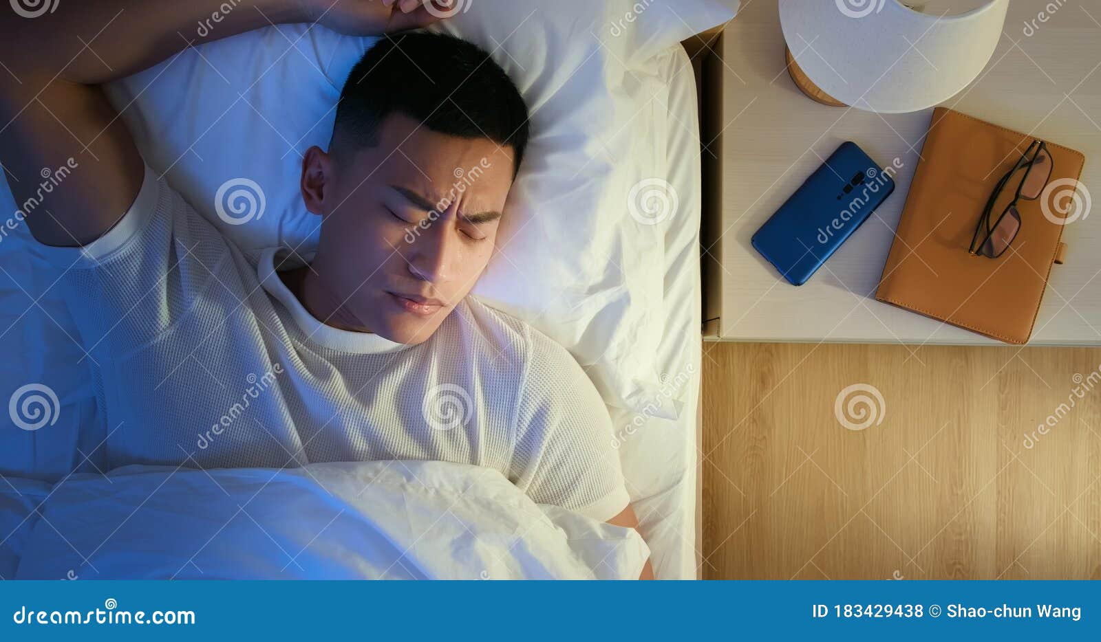 Asian man has insomnia stock photo. Image of pillow - 183429438