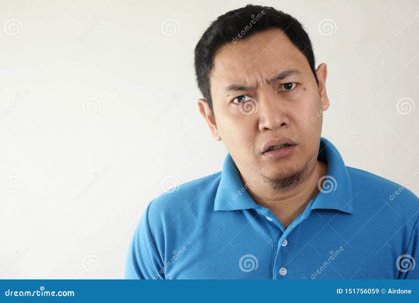 Asian Man Having Skeptical and Dissatisfied or Distrust Expression ...