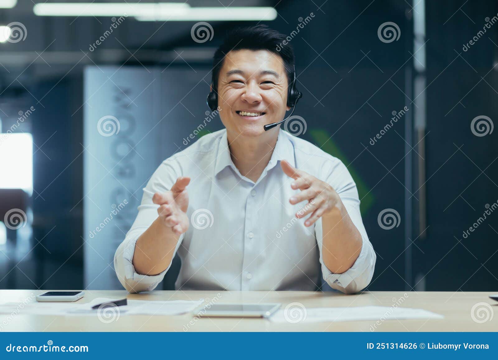 Asian Man with Headset Talking on Video Call Stock Photo - Image of ...