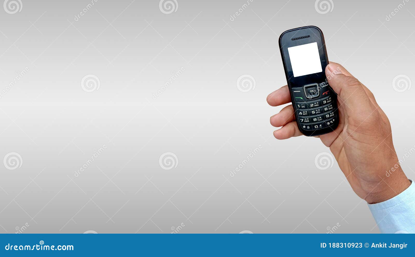 Asian Man Holding Feature or Keypad Phone in Hand Stock Image - Image ...