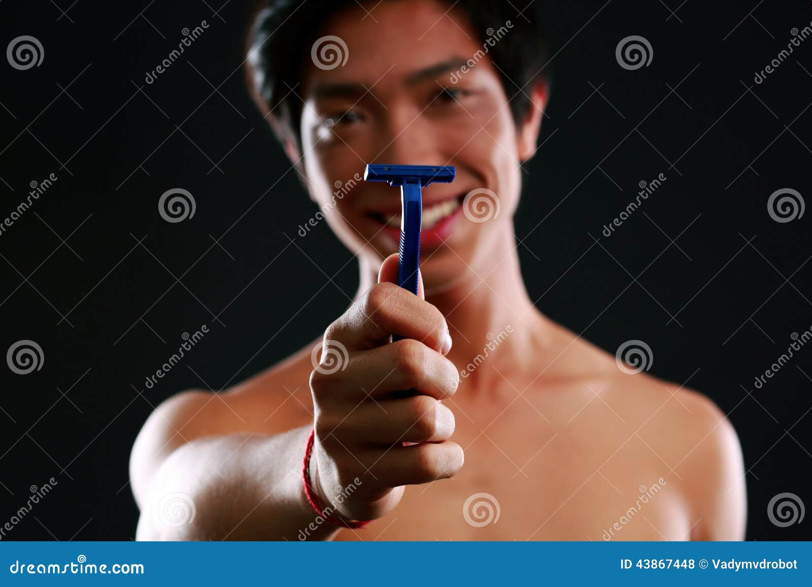 Asian man holding razor stock photo. Image of adult, smiling - 43867448