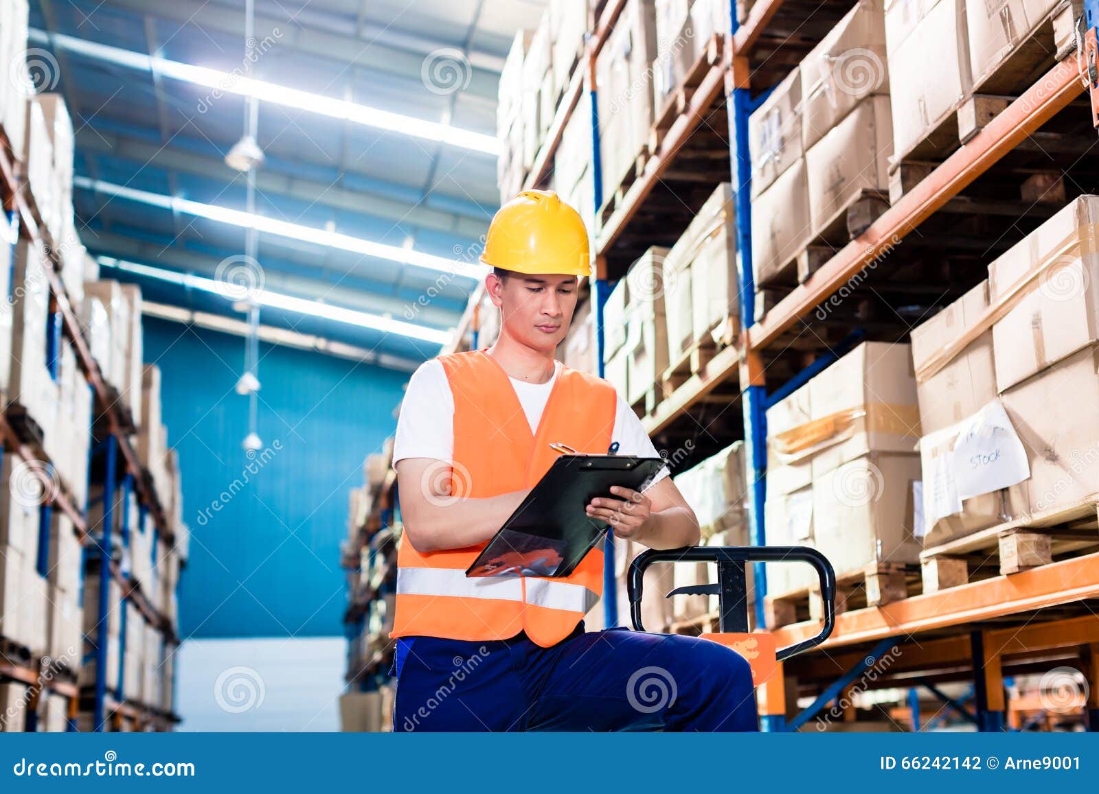Asian Man in Industrial Warehouse Checking List Stock Photo - Image of ...