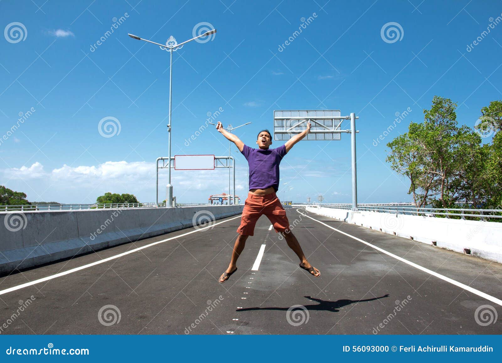 Asian Man Jump on the Empty Highway Stock Photo - Image of lifestyle ...
