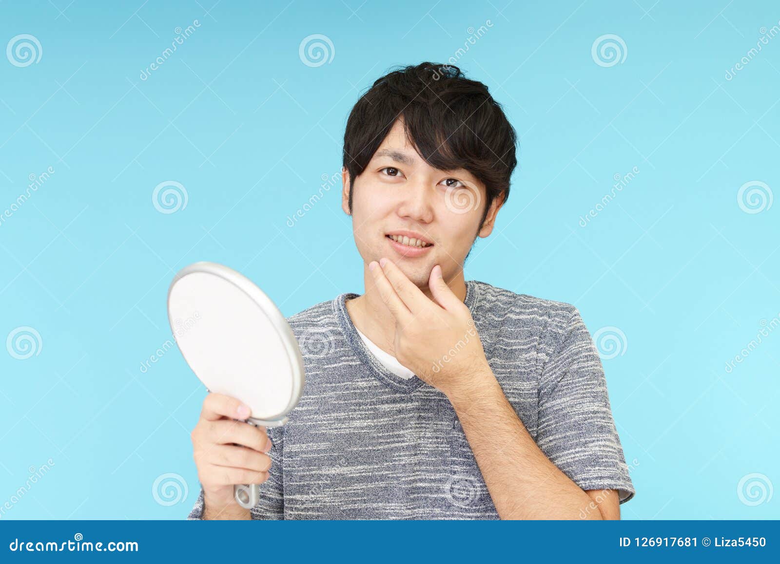 Relaxed Asian man. stock image. Image of hairstyle, expression - 126917681