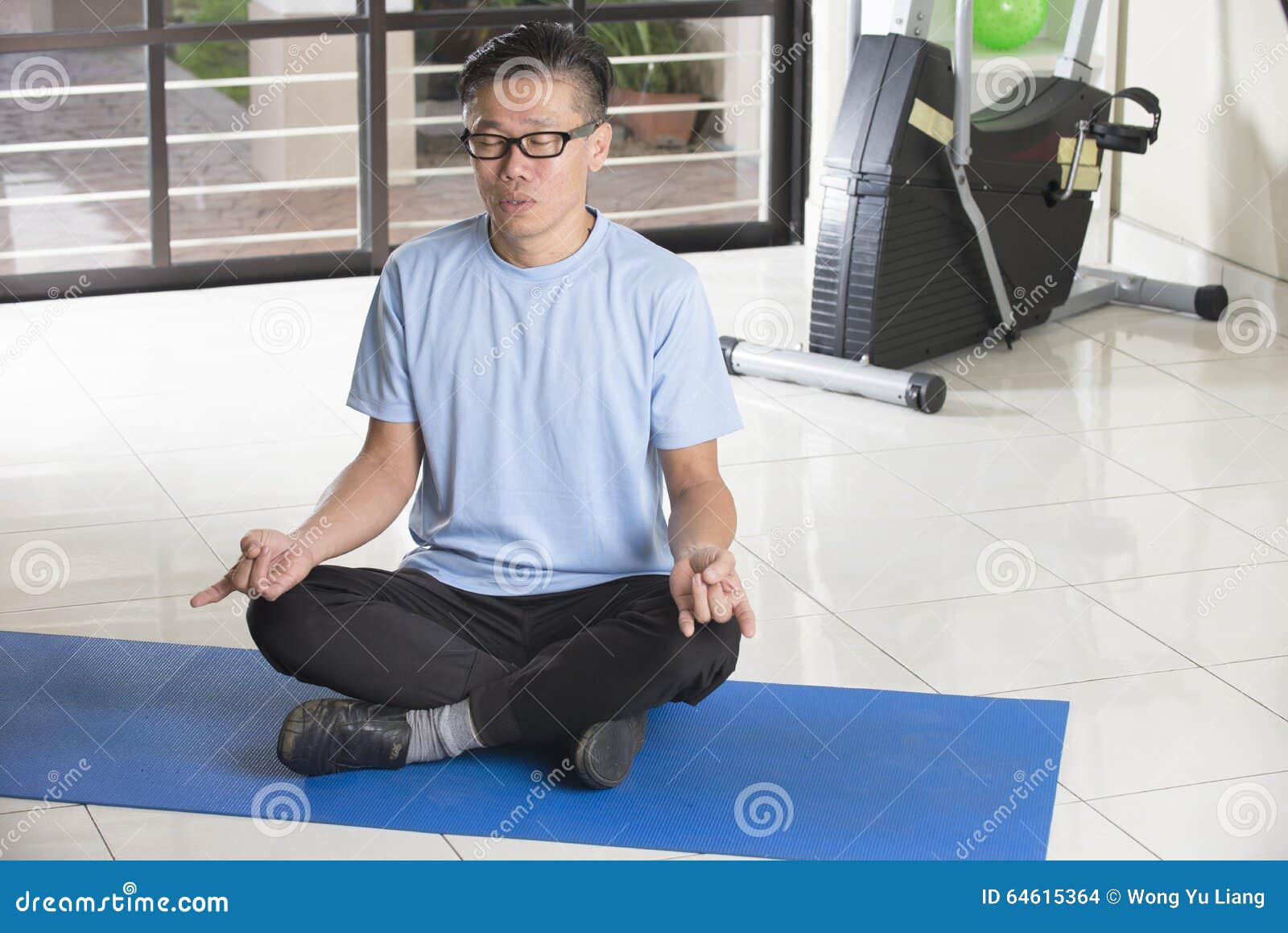 Asian Man Meditating Indoor Stock Photo - Image of senior, contemplate ...