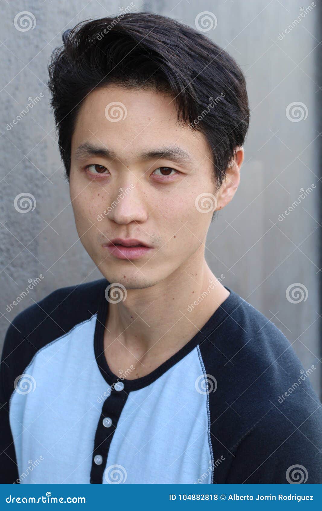 Asian Man with Neutral Expression Closeup Stock Photo - Image of ...