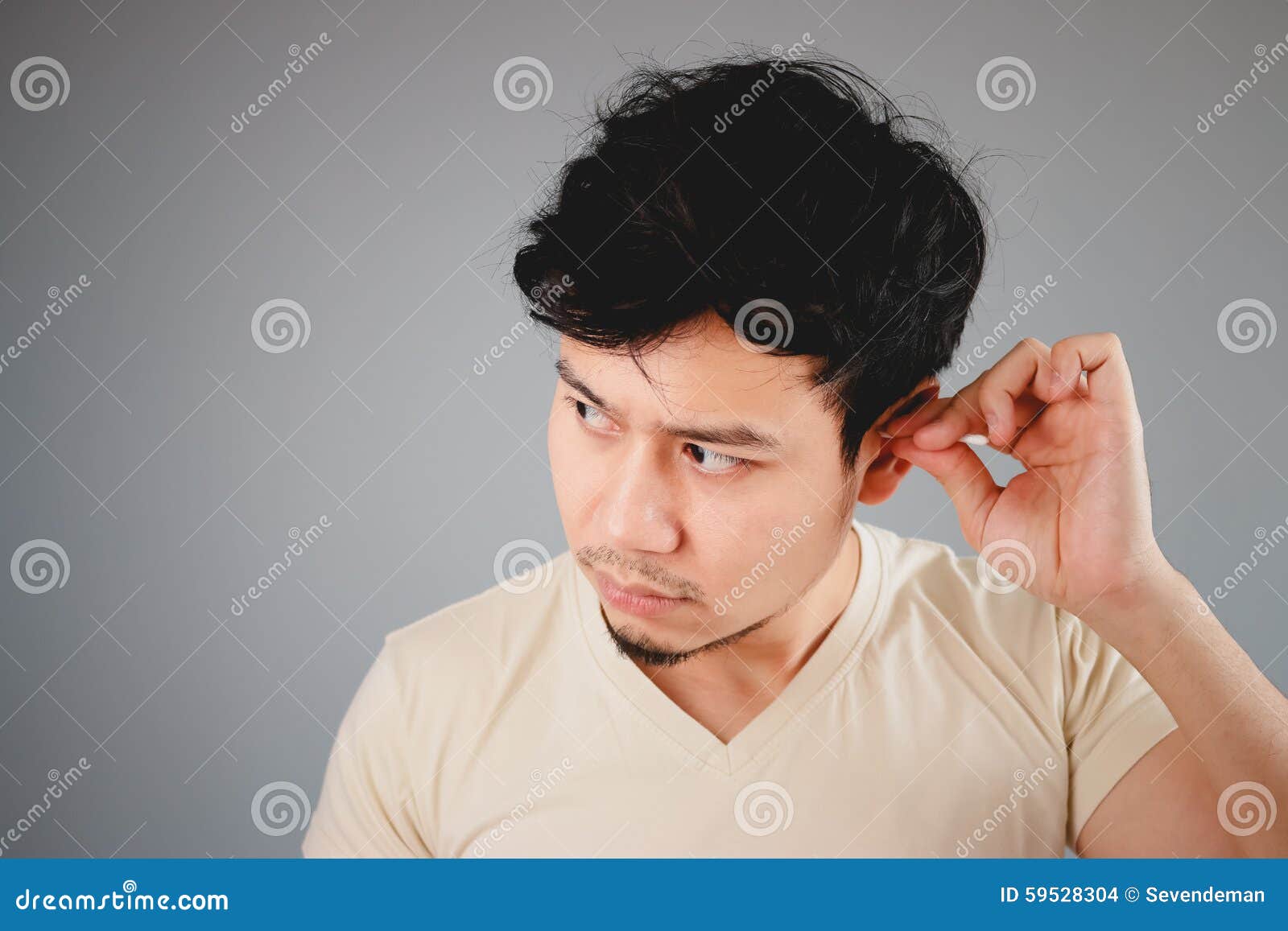 Asian man picking ear. stock photo. Image of looking - 59528304