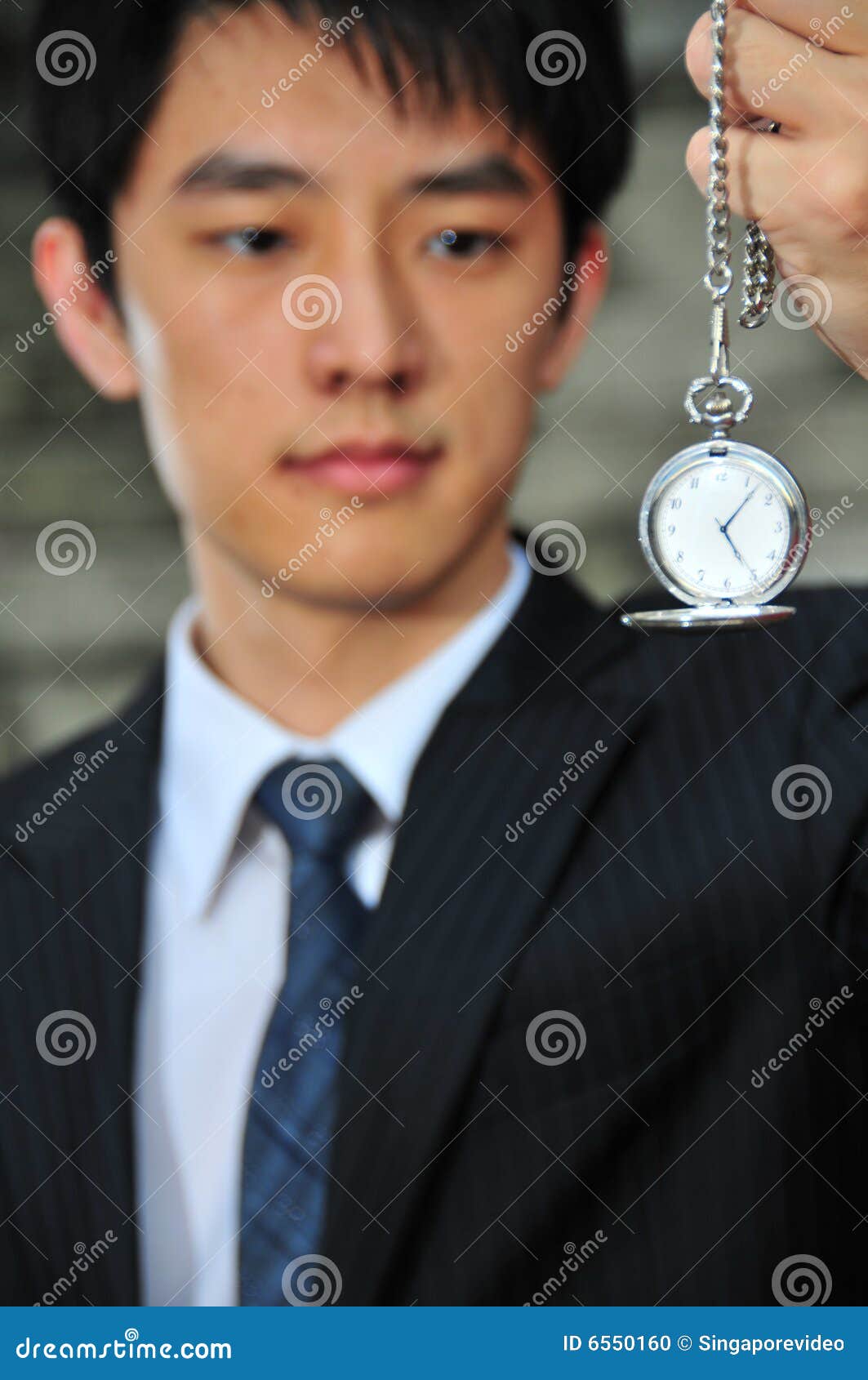 Asian Man With Pocket Watch 1 Picture. Image: 6550160