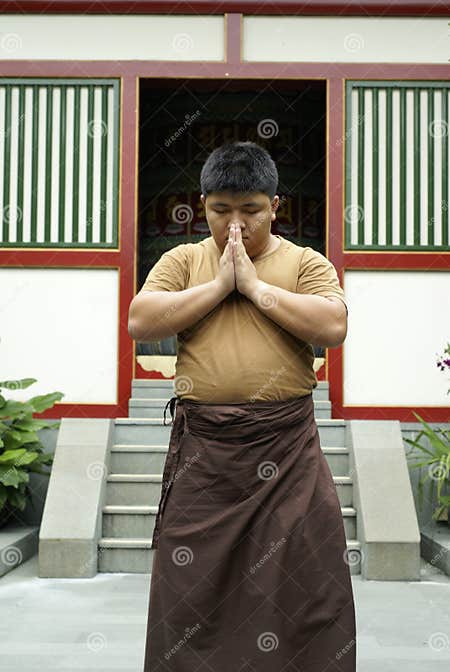Asian man praying standing stock photo. Image of praying - 7475582