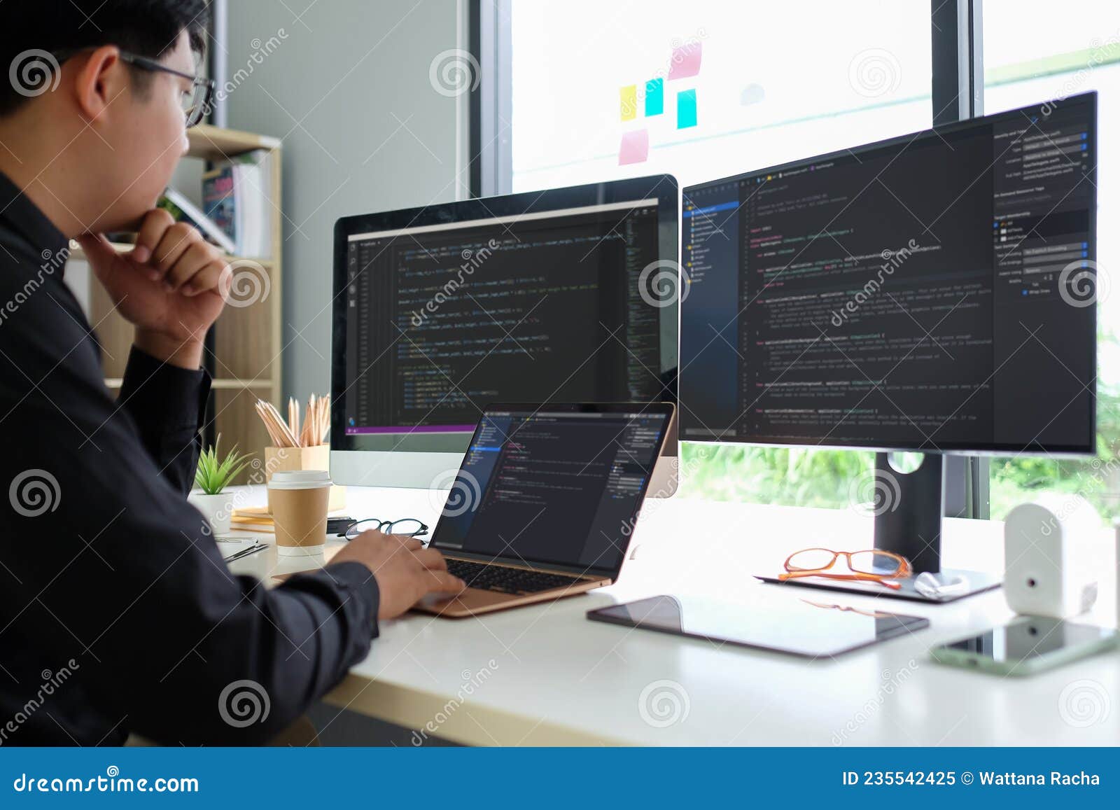 Asian Man Programmer Working at at Modern Office. Developing ...