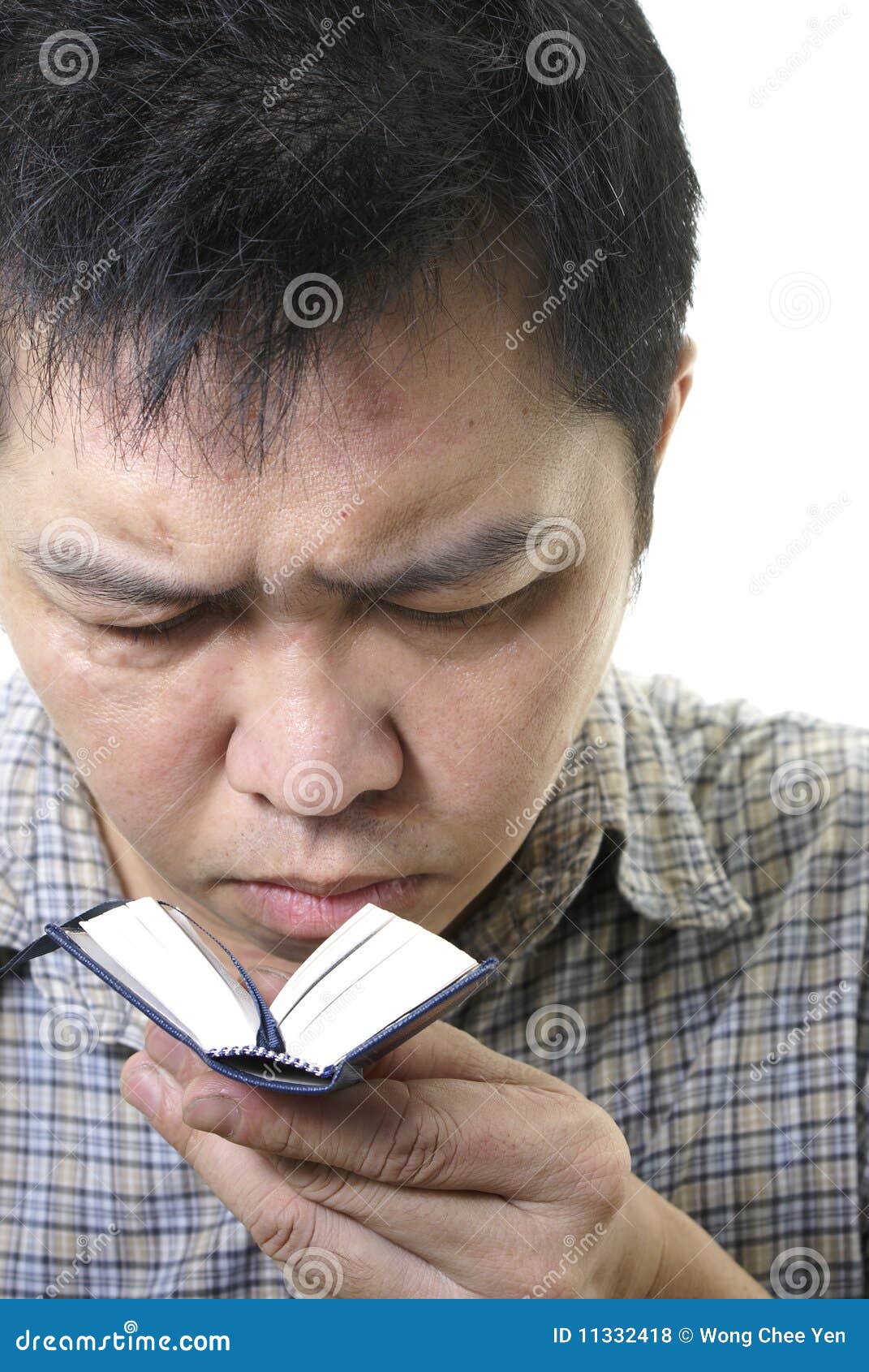 Asian man read small book stock photo. Image of tome - 11332418