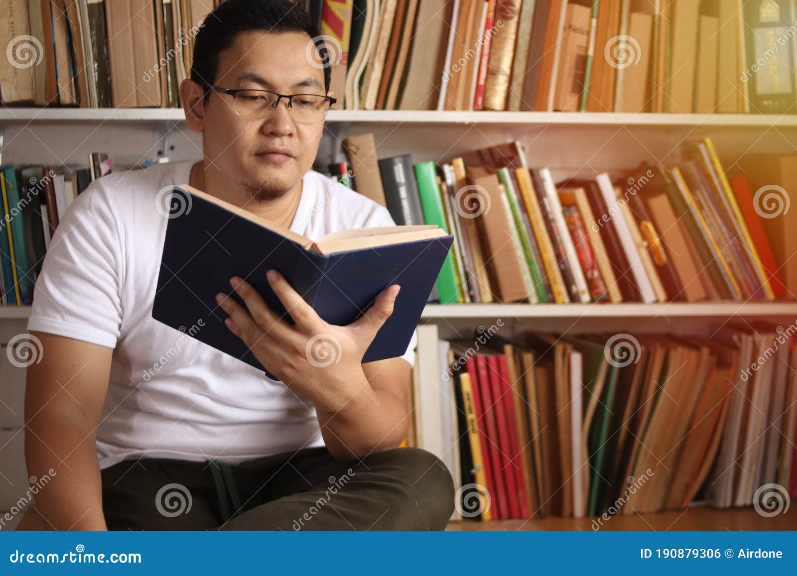 Asian Man Reading Book in Library, Educational Concept. Happy Smiling ...