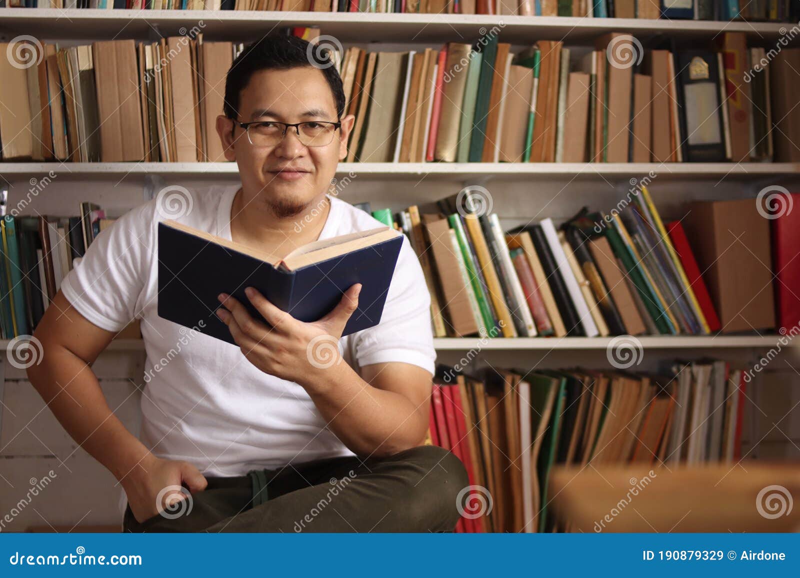 Asian Man Reading Book in Library, Educational Concept. Happy Smiling ...