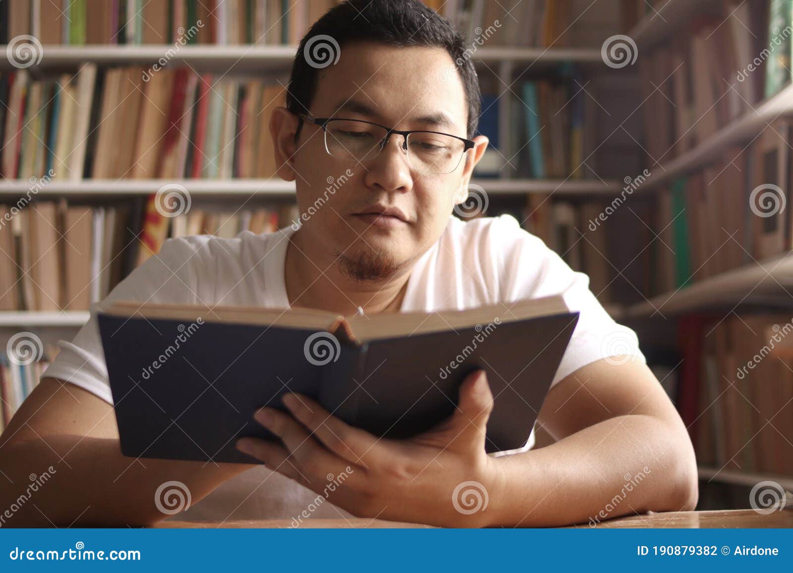 Asian Man Reading Book in Library, Educational Concept. Happy Smiling ...