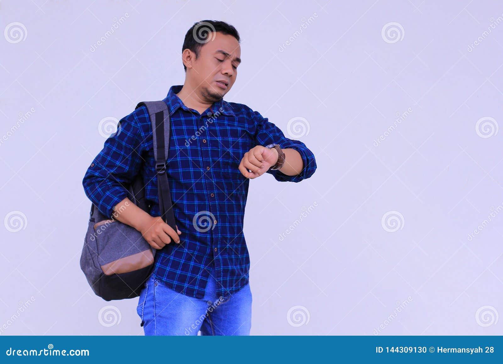 An Asian Man& X27;s Annoyed Expression for Waiting for Something Stock ...