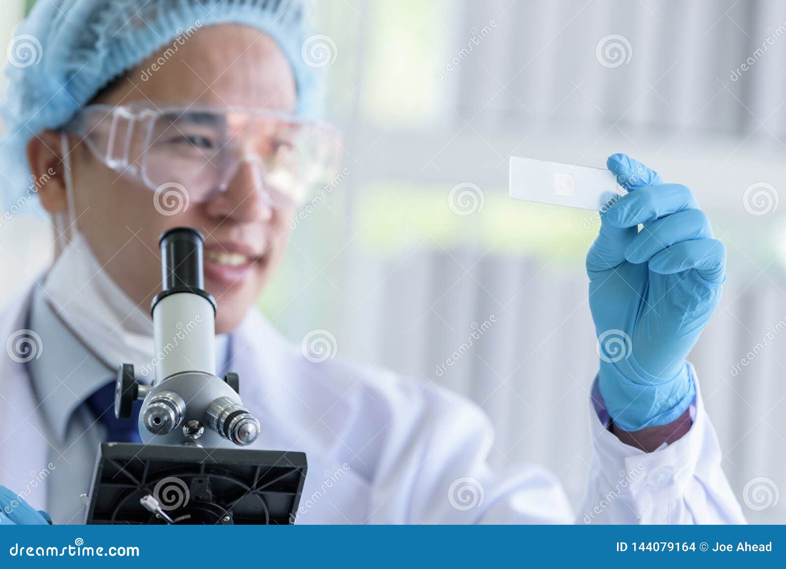Asian Man Scientist Researching and Learning in a Laboratory Stock ...
