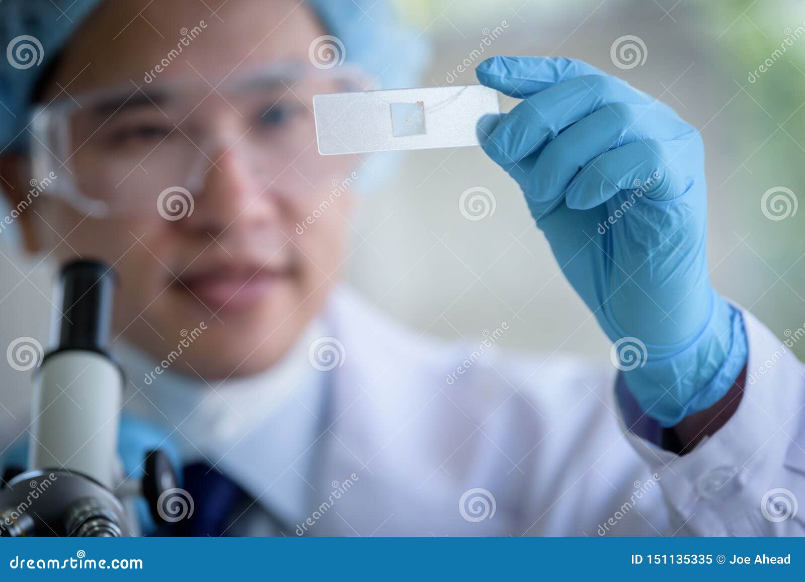 Asian Man Scientist Researching and Learning in a Laboratory Stock ...