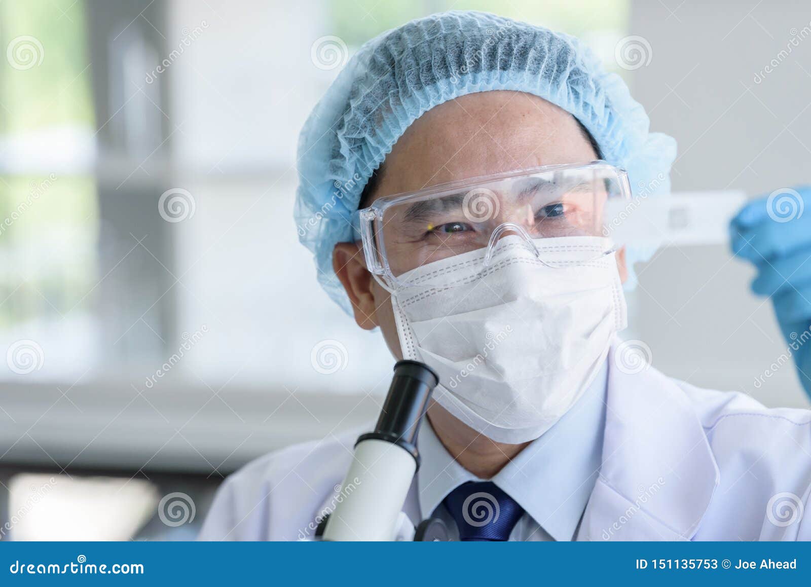 Asian Man Scientist Researching and Learning in a Laboratory Stock ...