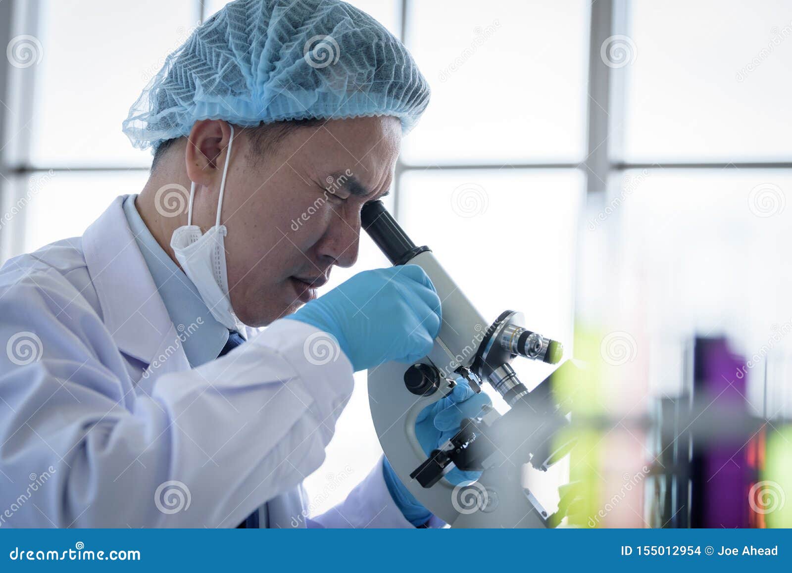 Asian Man Scientist Researching and Learning in a Laboratory Stock ...