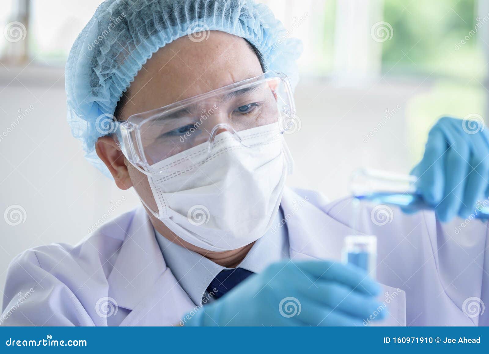 Asian Man Scientist Researching and Learning in a Laboratory Stock ...