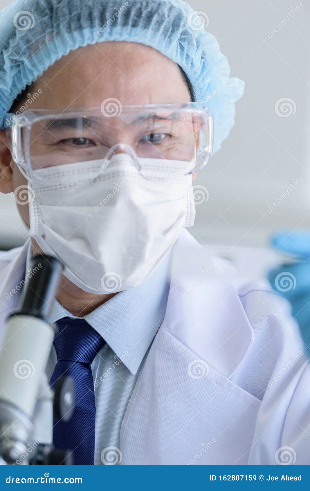 Asian Man Scientist Researching and Learning in a Laboratory Stock ... Asian Man Scientist Researching and Learning in a Laboratory Stock ...