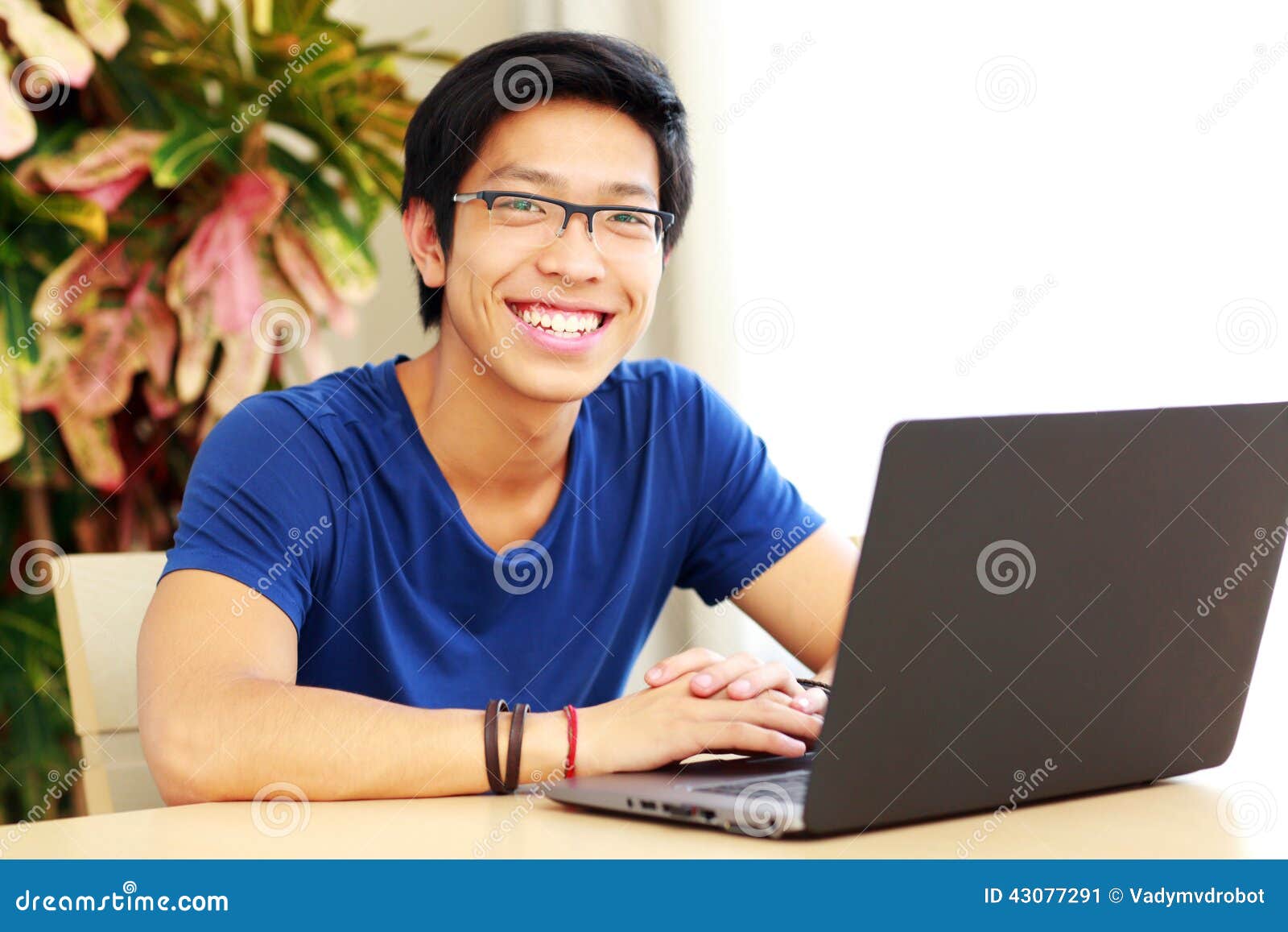 Asian Man Sitting at the Table with Laptop Stock Image - Image of desk ...