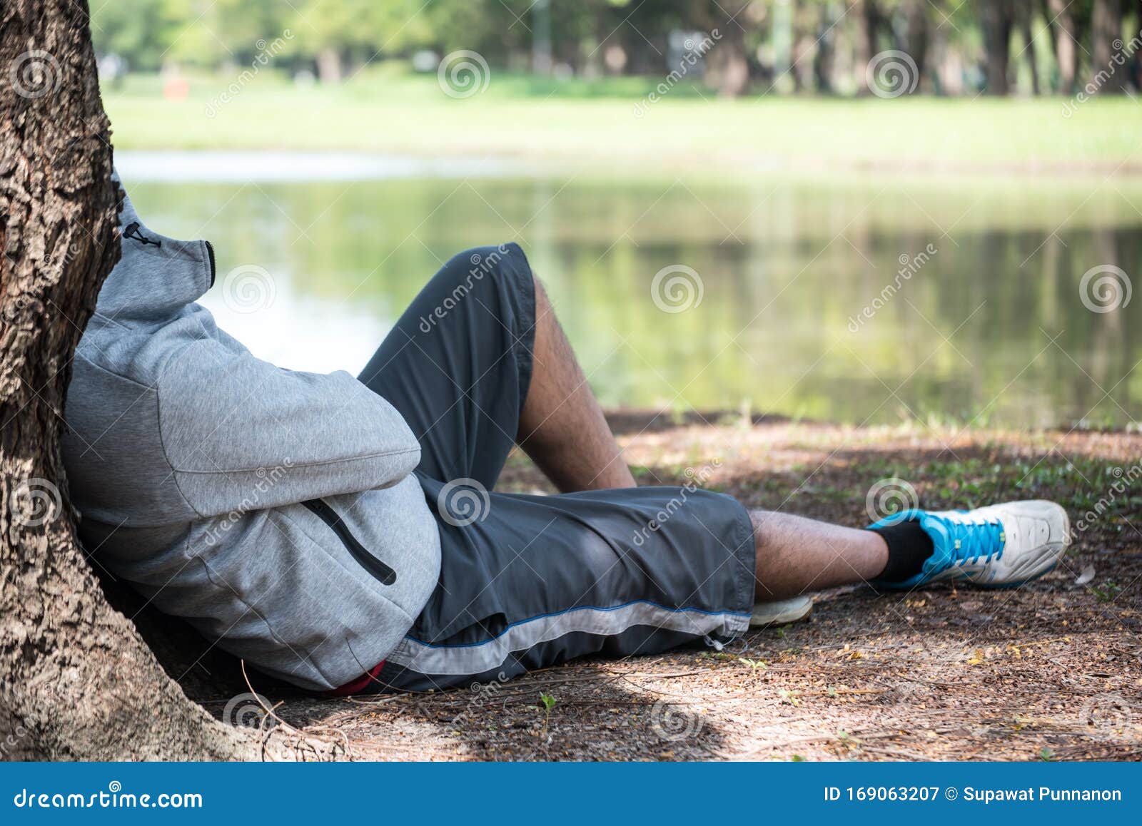 Asian Man Sleeping Under a Tree after Exercise Stock Image - Image of ...