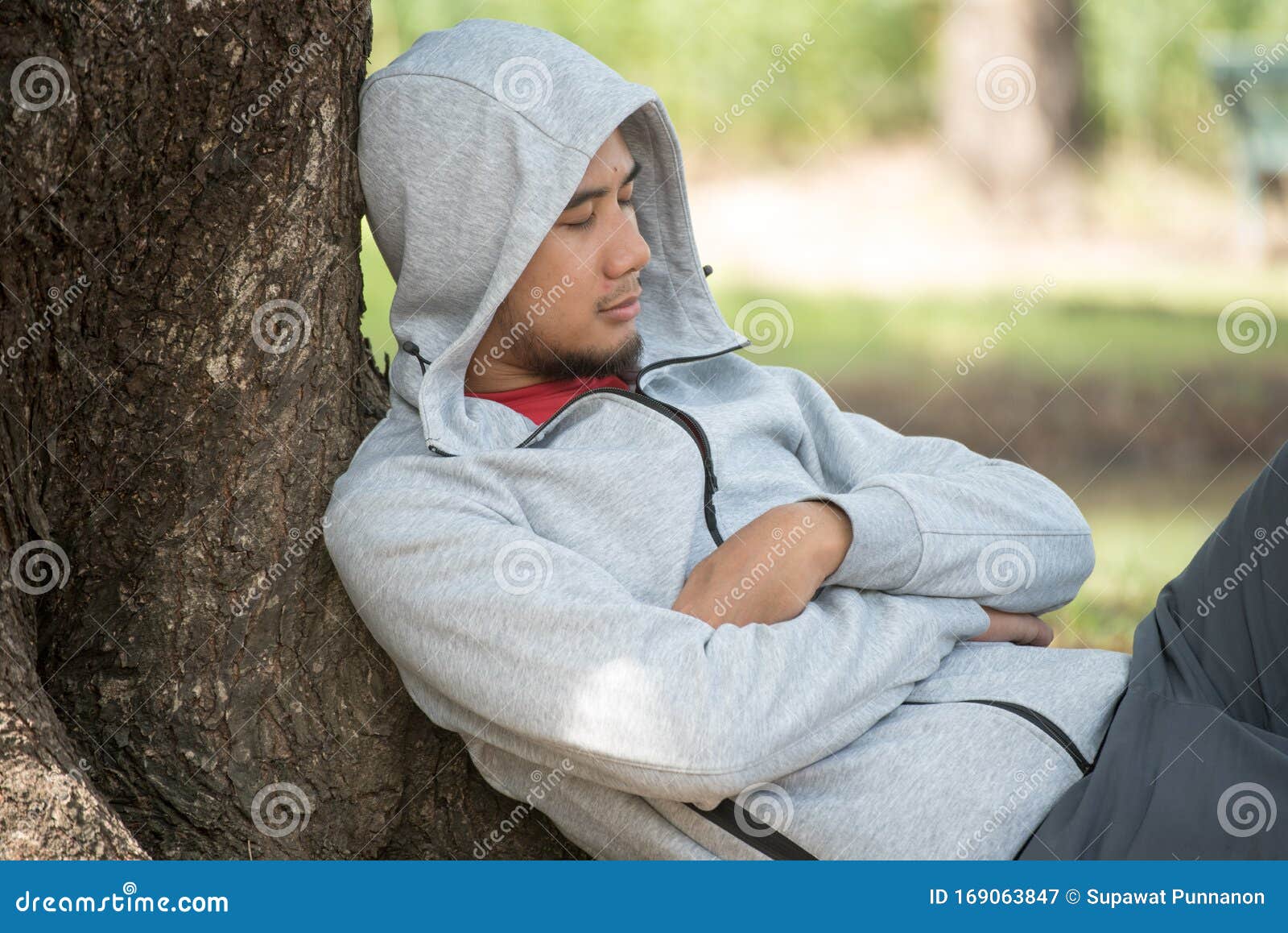 Asian Man Sleeping Under a Tree after Exercise Stock Image - Image of ...
