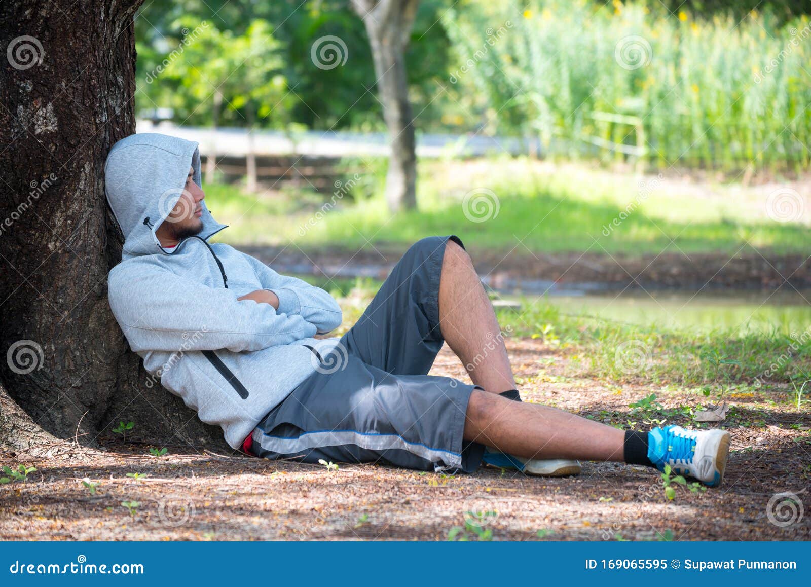 Asian Man Sleeping Under a Tree after Exercise Stock Image - Image of ...