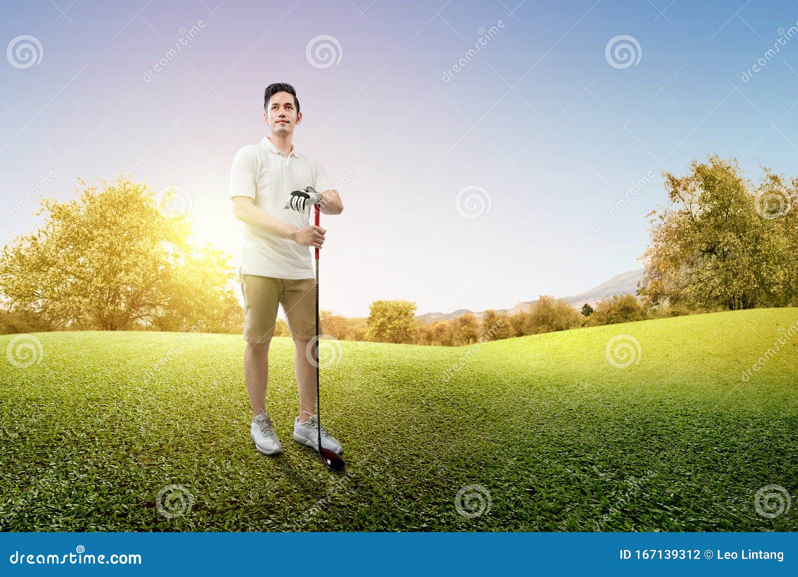 Asian Man Standing with a Golf Club Stock Photo - Image of hobby ...