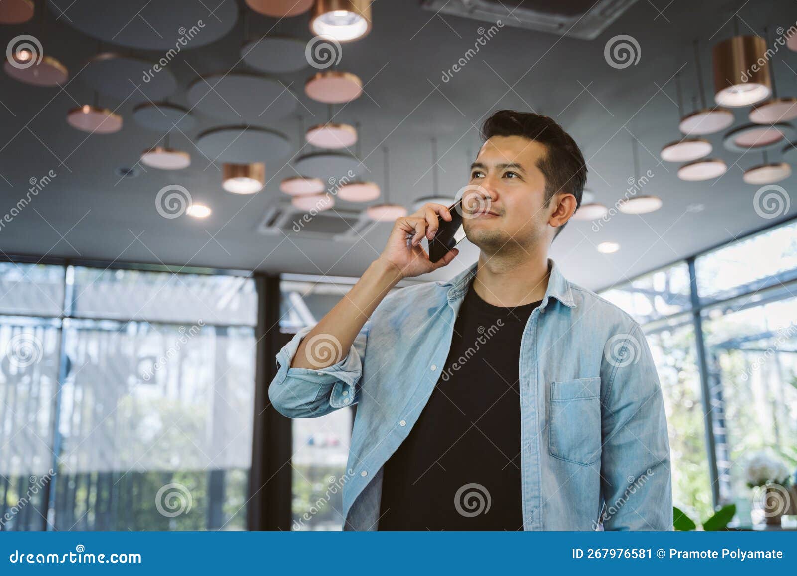Asian Man Take a Call in a Cafe. Handsome Young Man Stock Image - Image ...