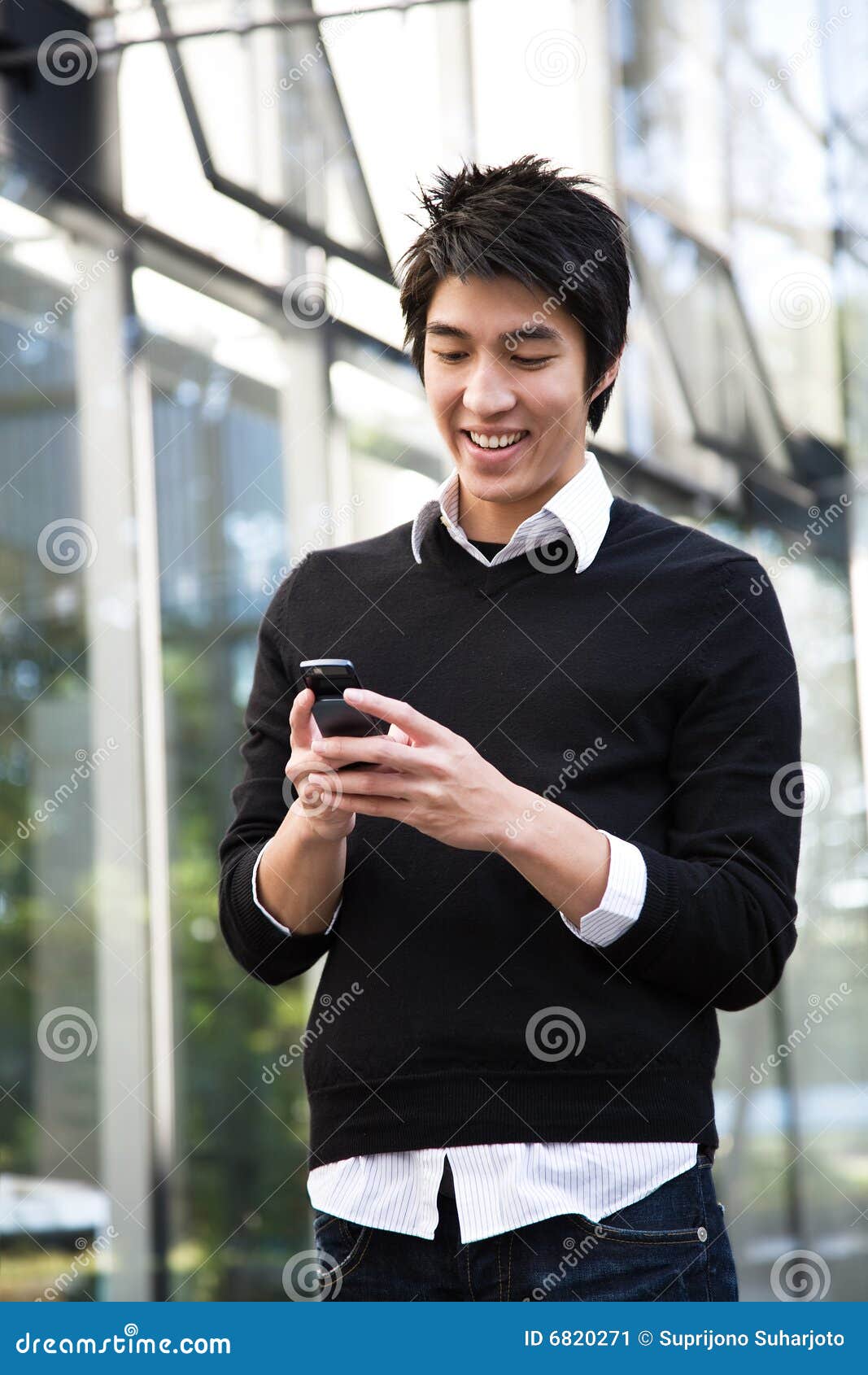 Asian man texting stock image. Image of communicate, phone - 6820271
