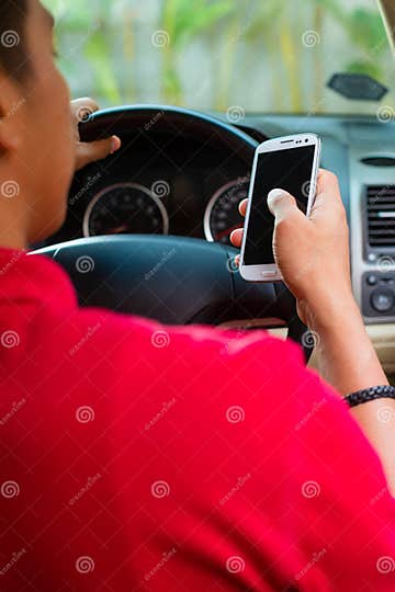 Asian Man Texting while Driving Stock Image - Image of phone, holding ...