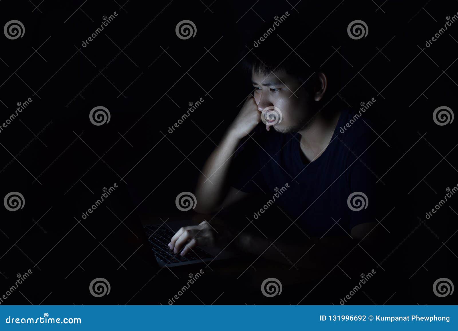 Asian Man Using Laptop in the Black Dark Room and Show Thinking ...