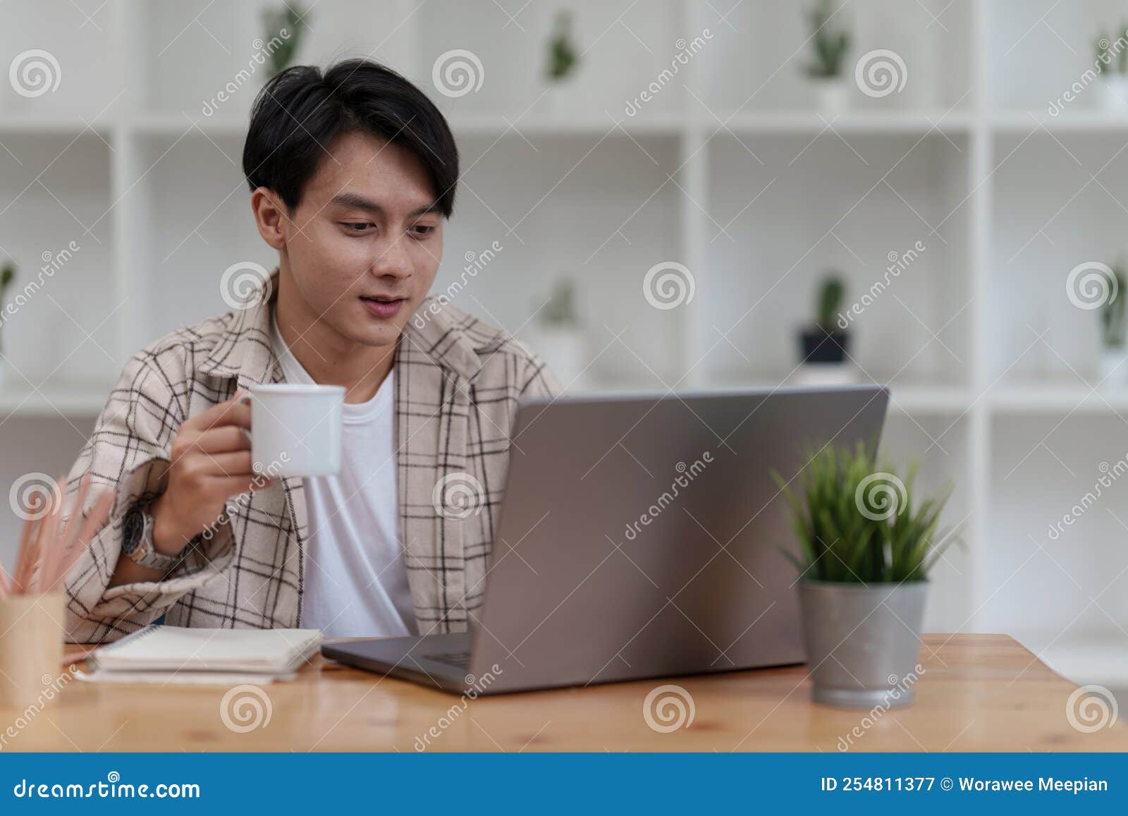 Asian Man Using Laptop Computer Working at Office. Creative and New ...