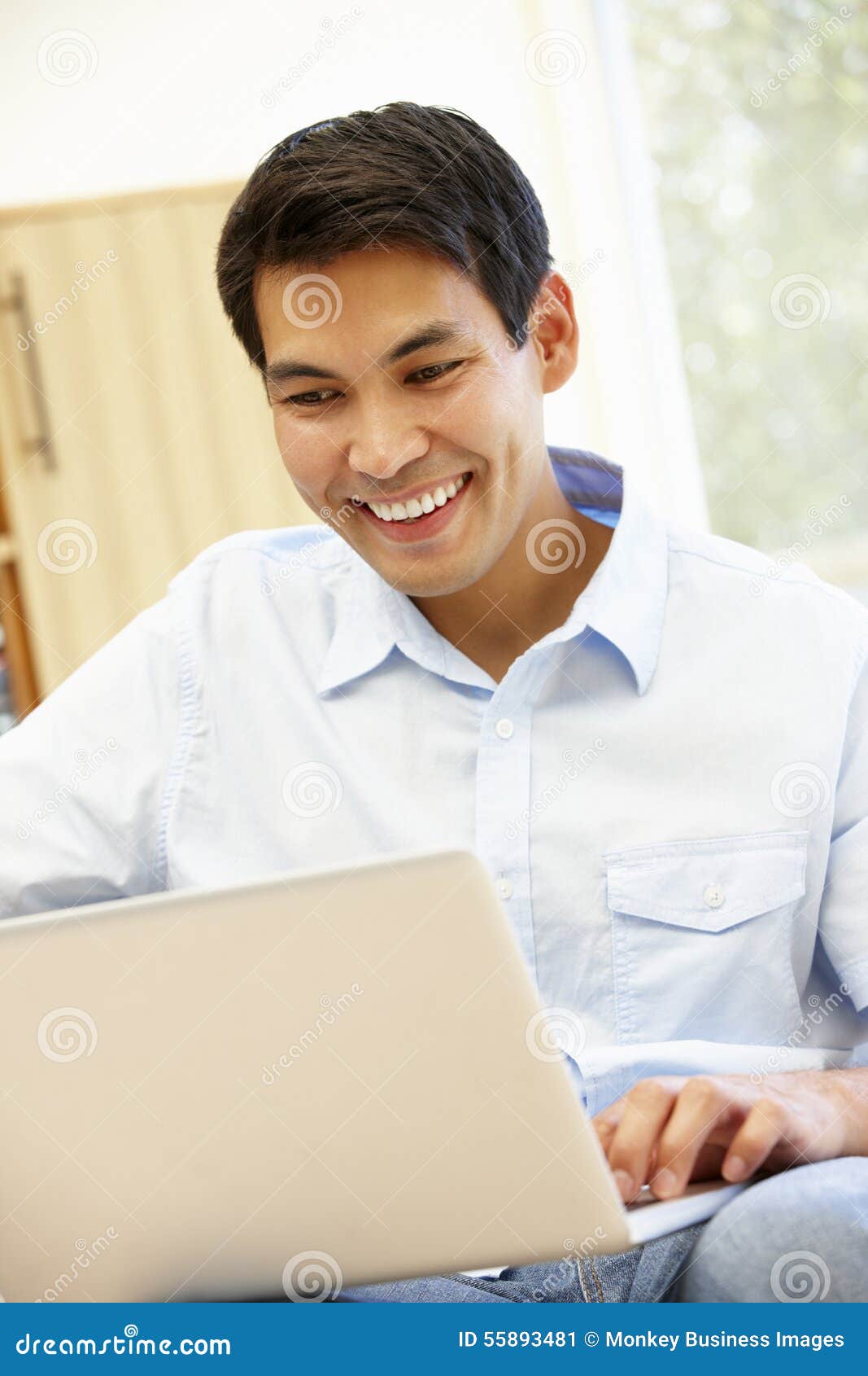Asian Man Using Laptop at Home Stock Image - Image of lifestyle ...