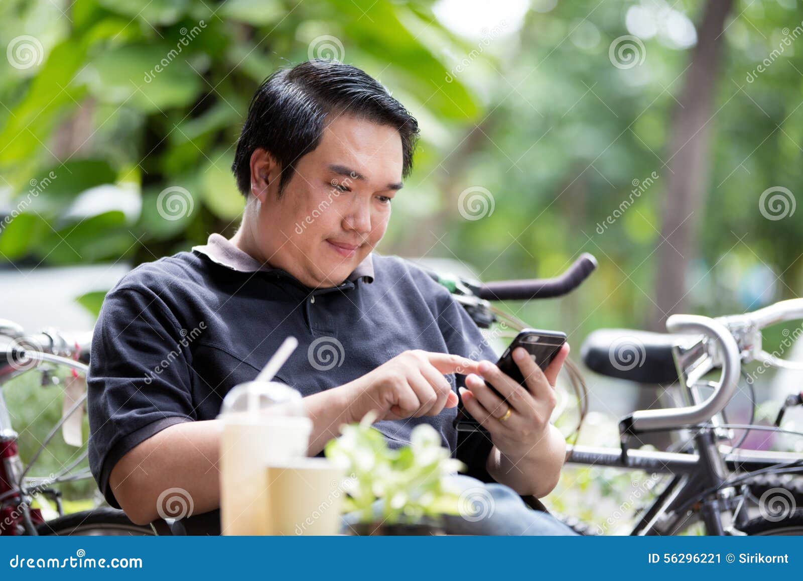 Asian Man Using on a Mobile Phone Stock Image - Image of modern, mobile ...