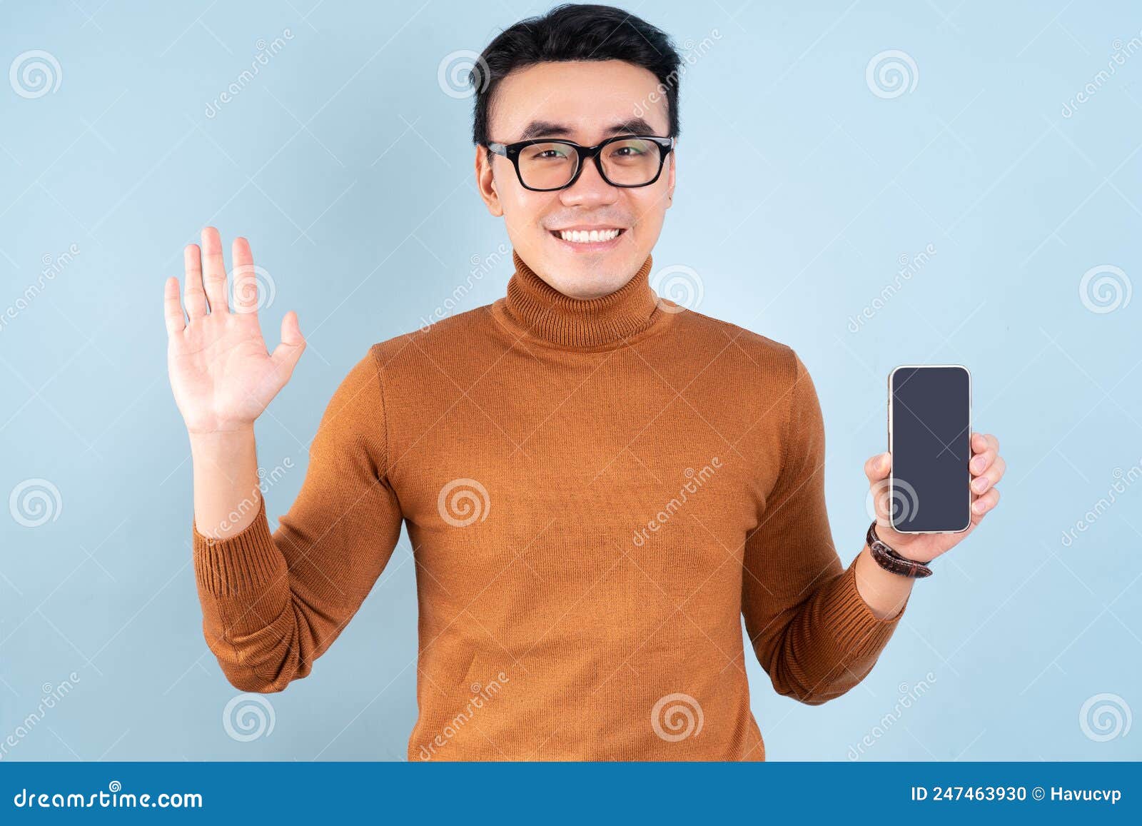 Asian Man Using Smartphone on Blue Background Stock Photo - Image of ...