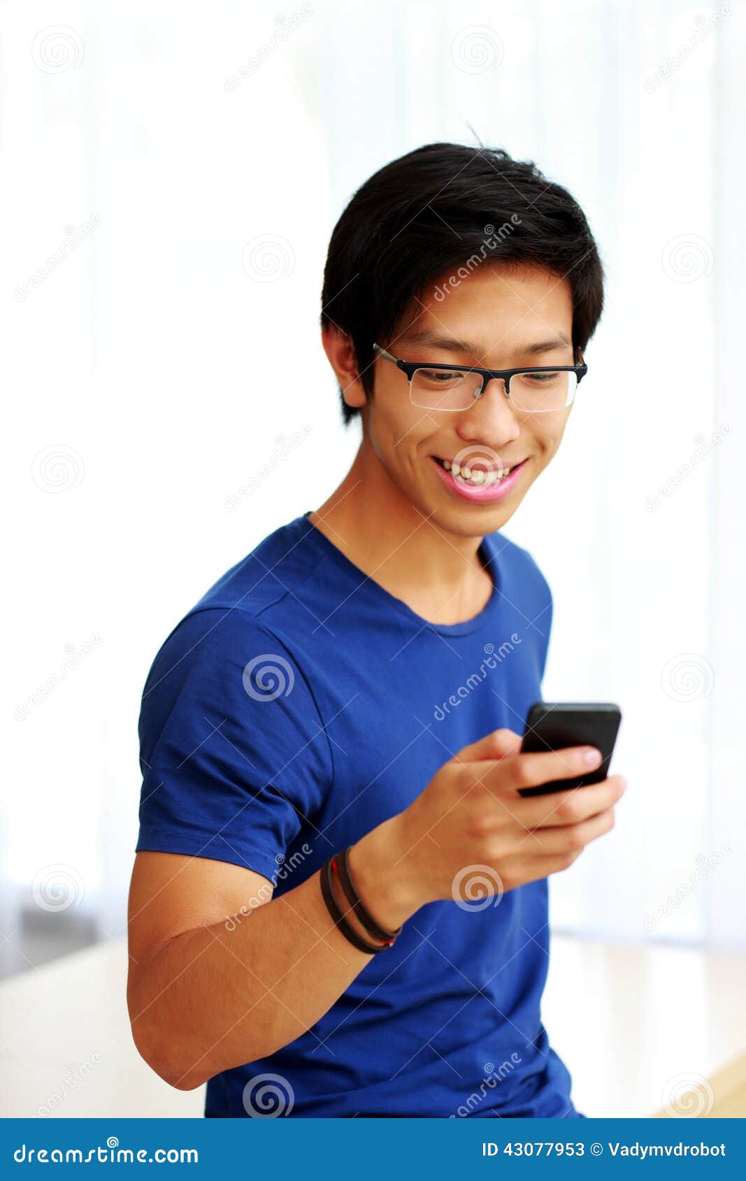 Asian Man Using Smartphone at Home Stock Image - Image of call, mobile ...