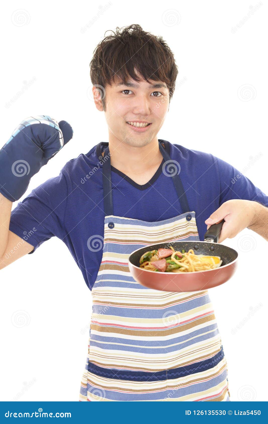Cooking man in apron stock photo. Image of attractive - 126135530