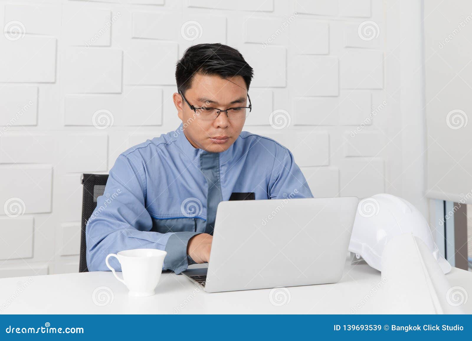 Asian man working stock image. Image of foreman, aged - 139693539