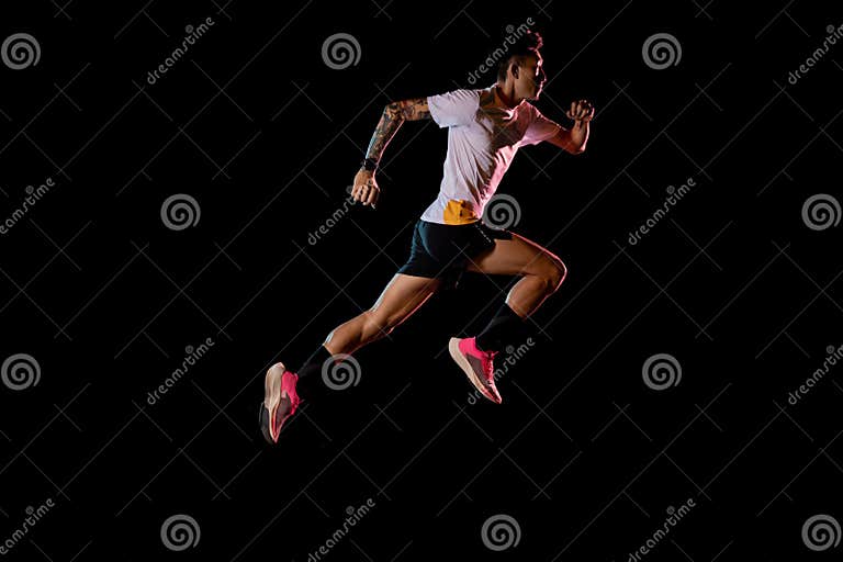 Asian Man Young Sprinter Runner Running in Studio on Black Background ...