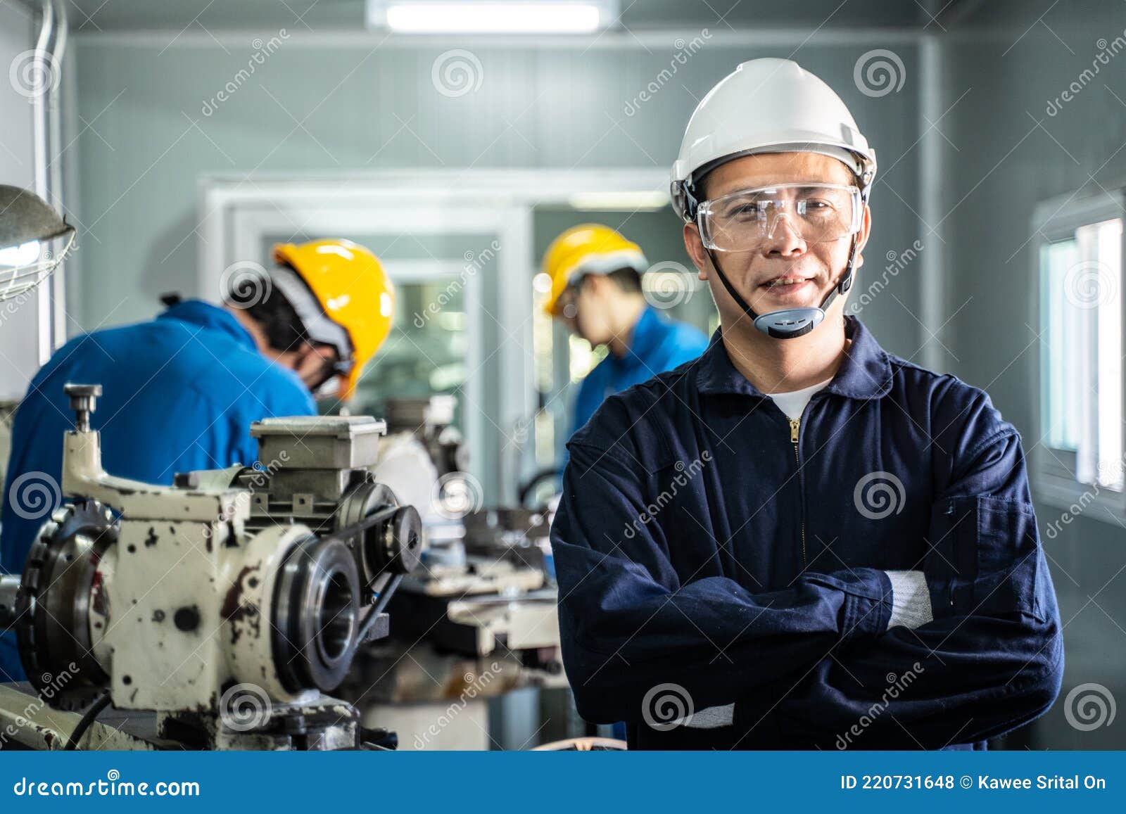 Asian Mechanical Workers Working on Milling Machine. the Technicians ...