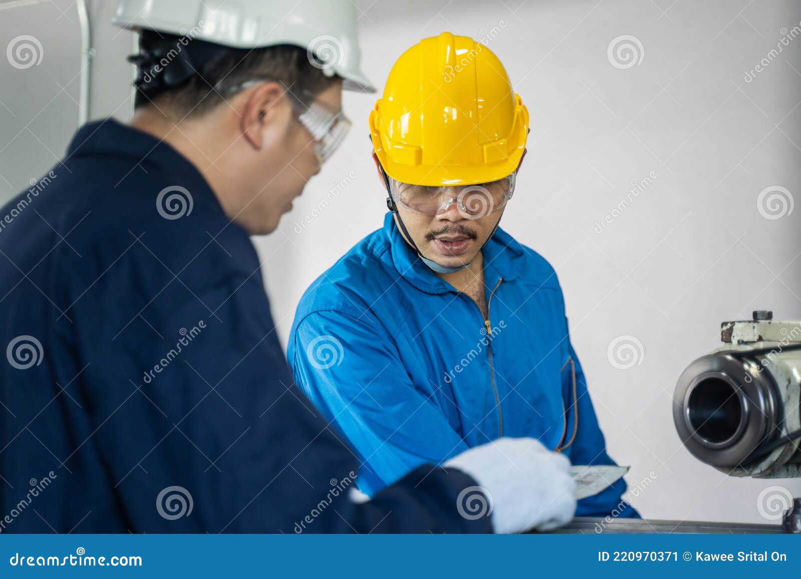 Asian Mechanical Workers Working on Milling Machine. the Technicians ...