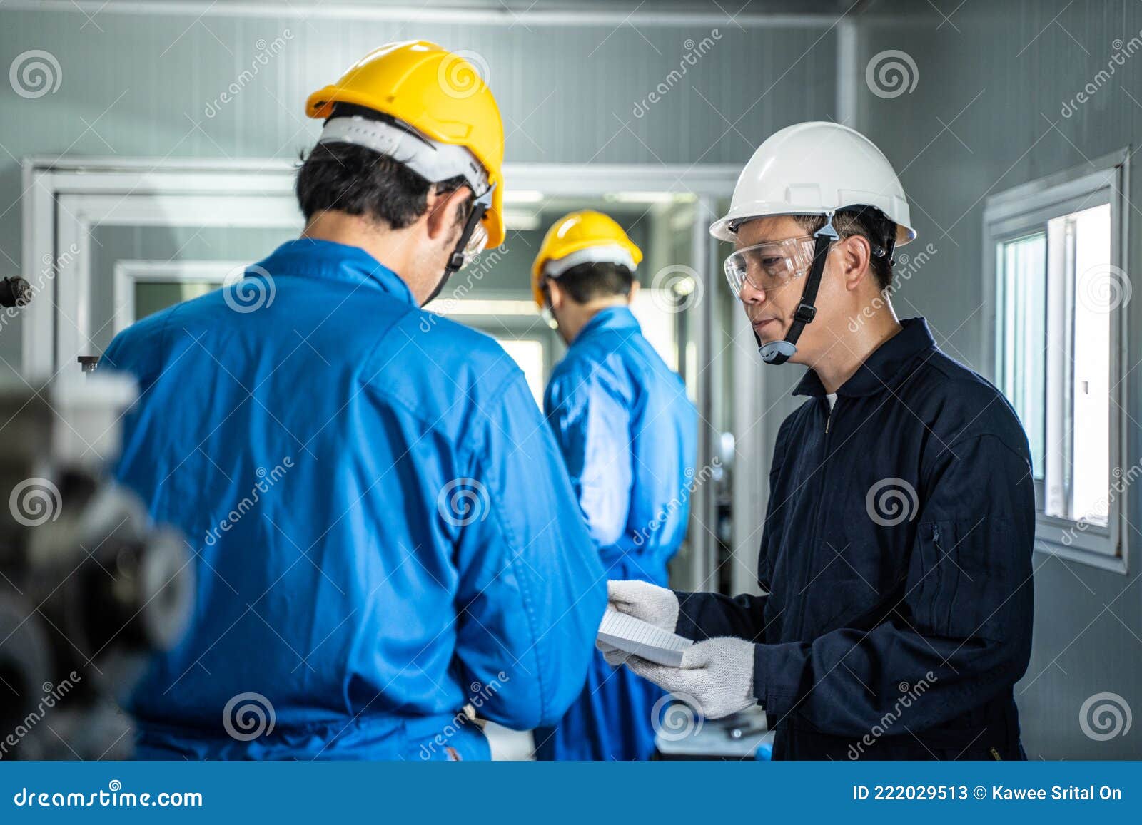 Asian Mechanical Workers Working on Milling Machine. the Technicians ...